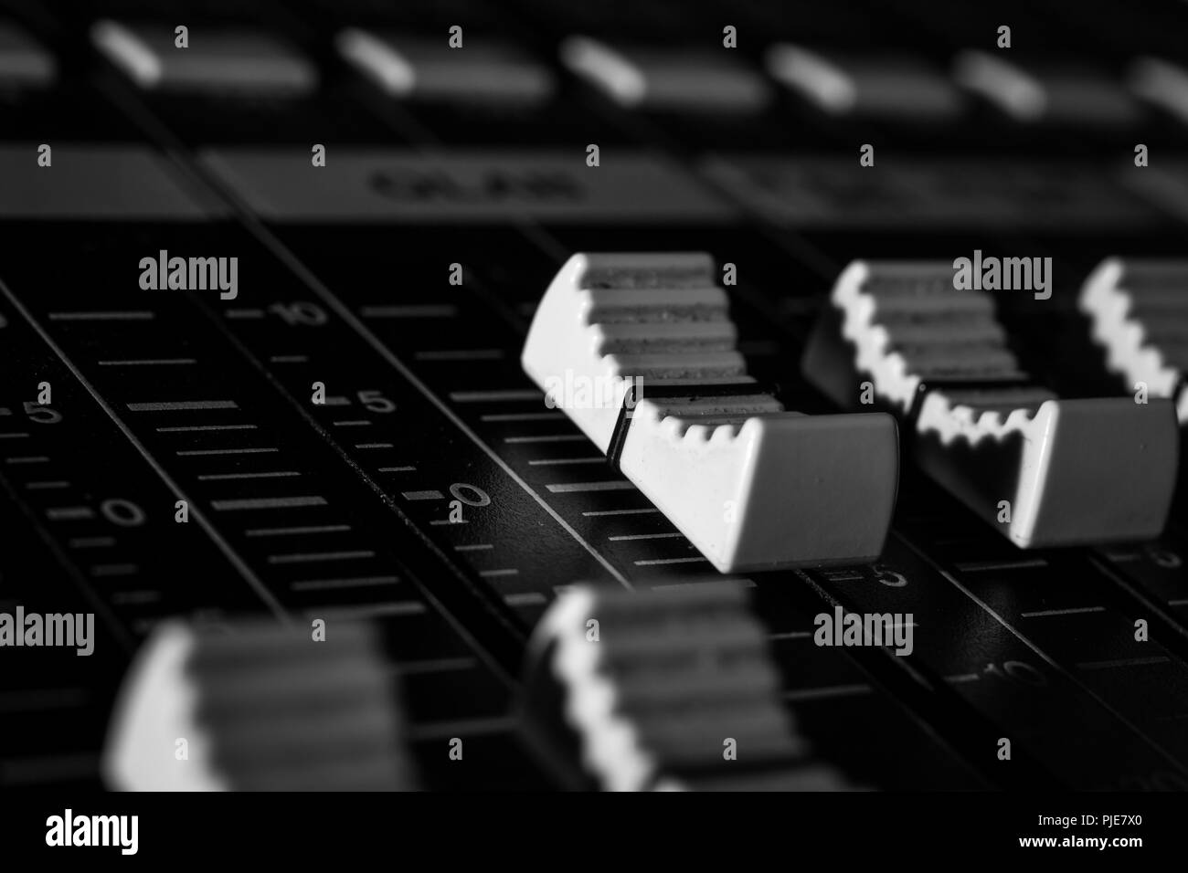 Closeup view of Faders on Professional digital Audio mixing control ...