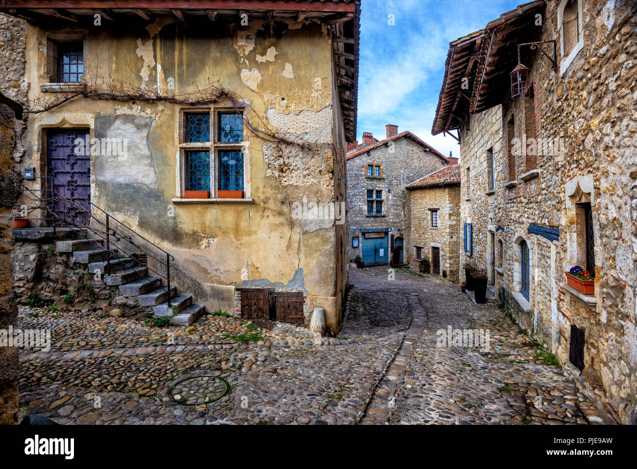Cobbled streets of Perouges, a medieval walled old town near Lyon ...