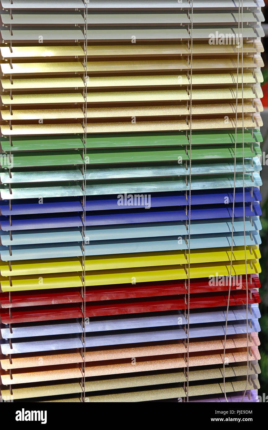 Metallic aluminum blinds in all rainbow colors Stock Photo - Alamy