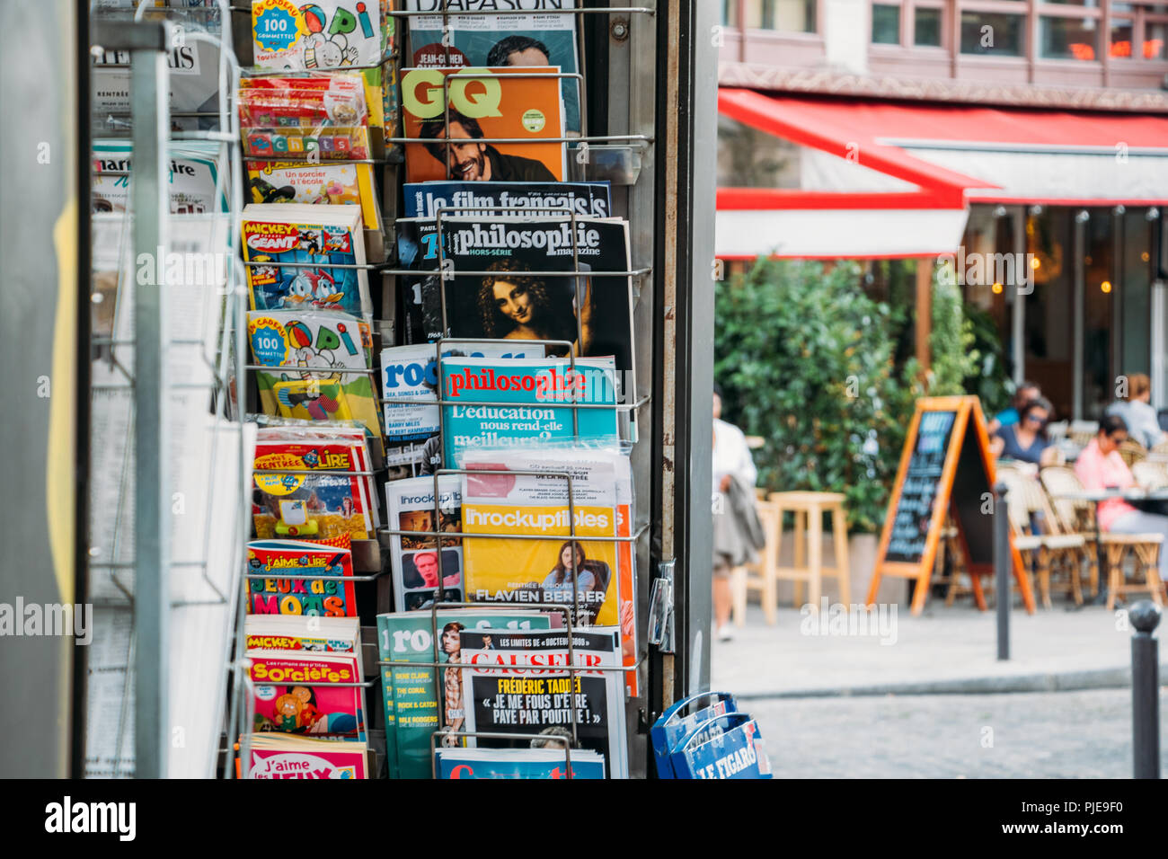 Paris, France - Sept 6, 2018: Close up of newspapers and magazines on a ...
