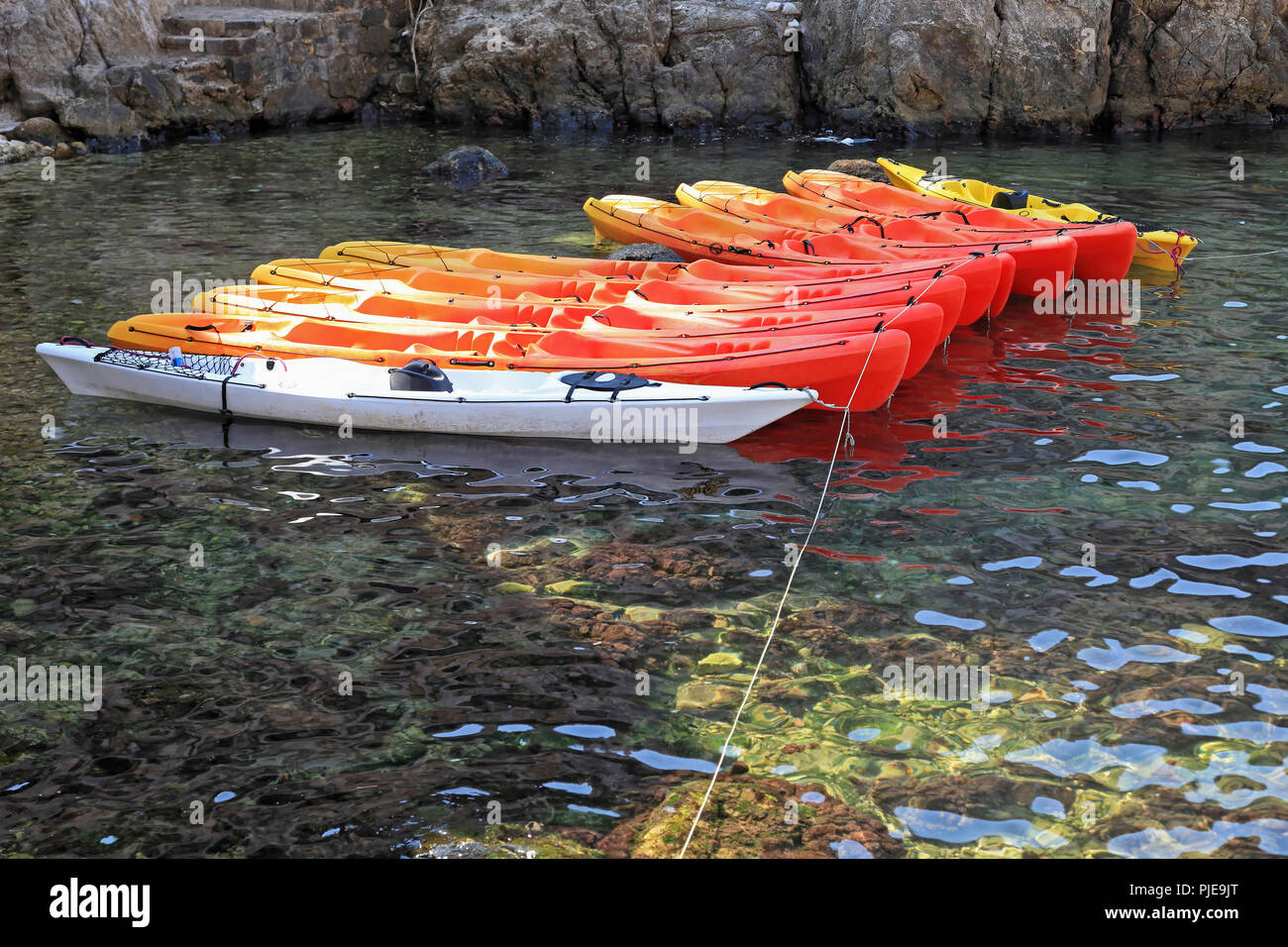 Group of plastic kayaks at mooring in Adriatic sea Stock Photo - Alamy