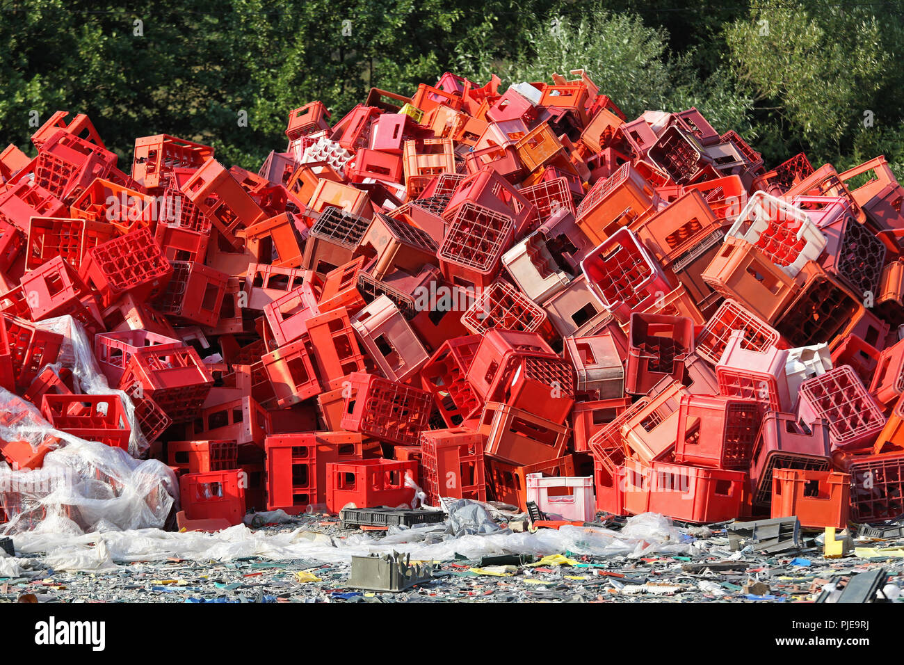 Big bunch of red crates for recycling Stock Photo - Alamy