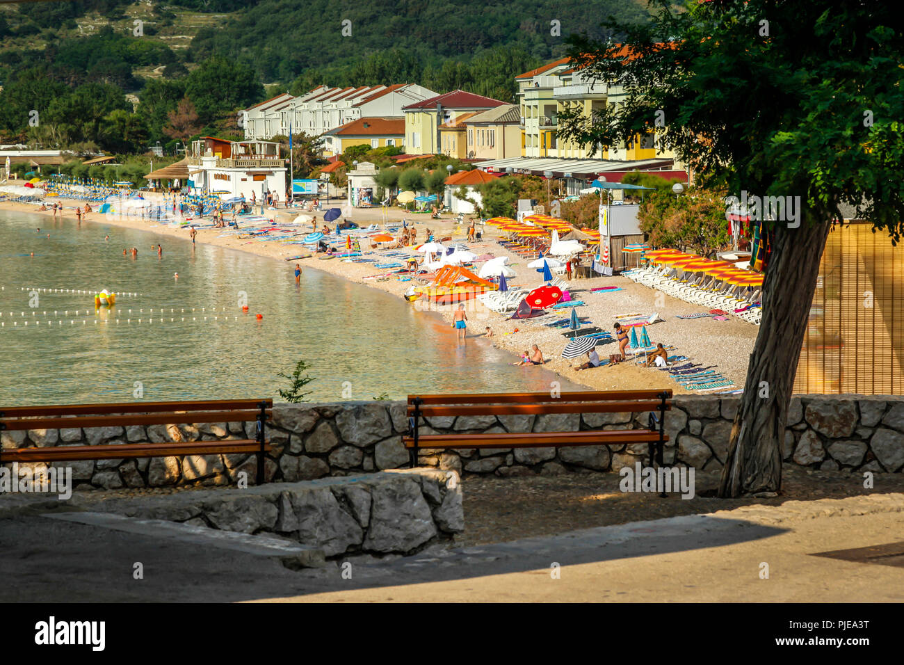 An overview of the beach at The small seaside resort of Baska on the ...
