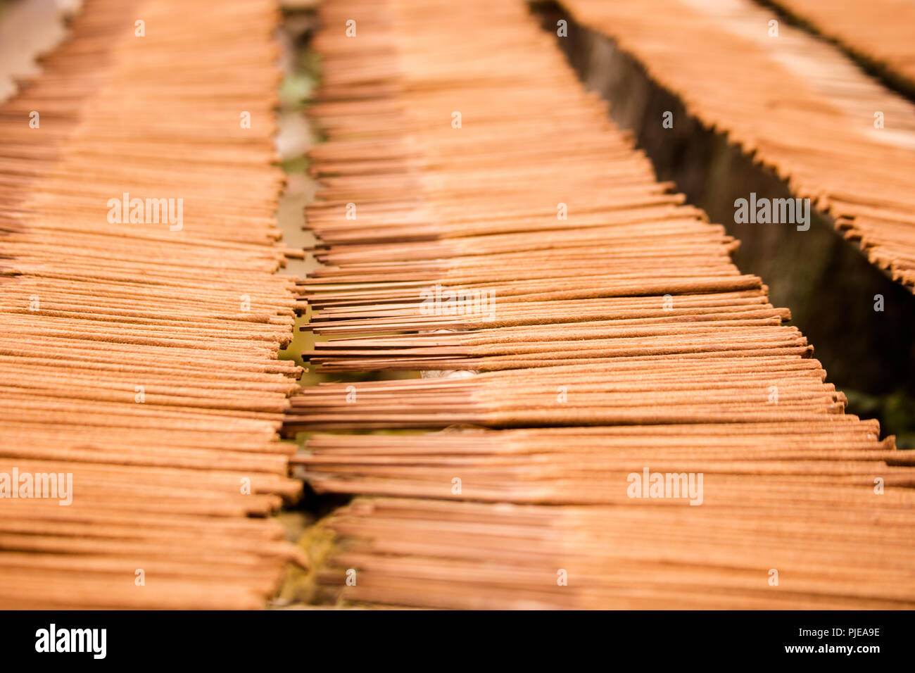 Traditional hand-made incense drying in the sun in Sapa, northern ...