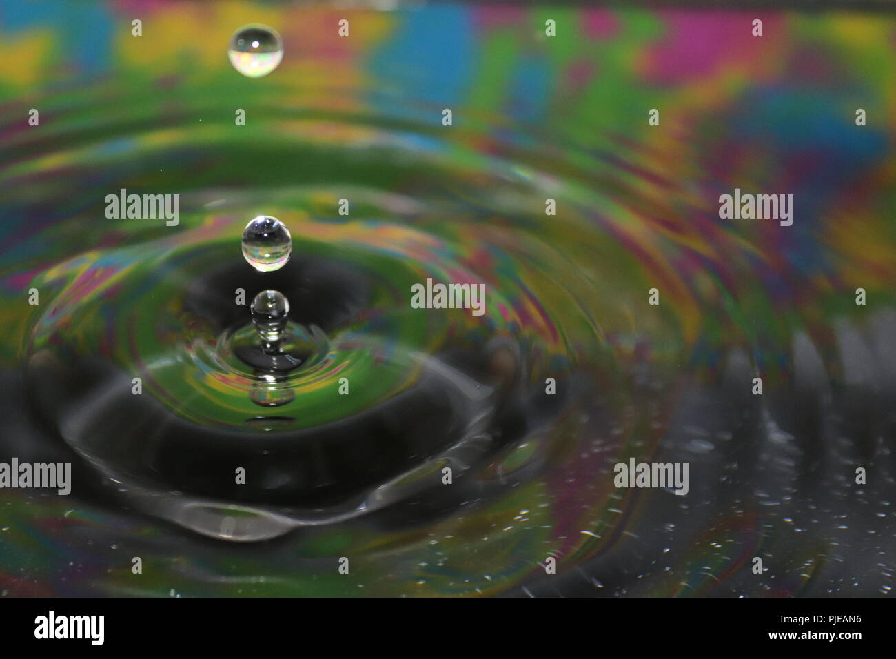 Abstract water droplets photography,drips and drops of water creating ...