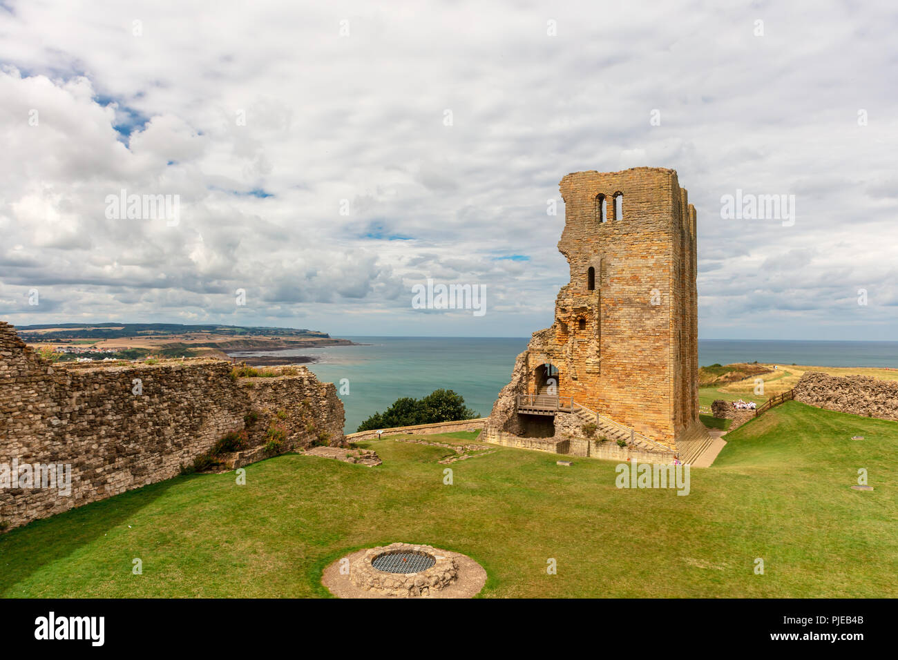Dramatic cliff side landscape with Scarborough Castle in North ...