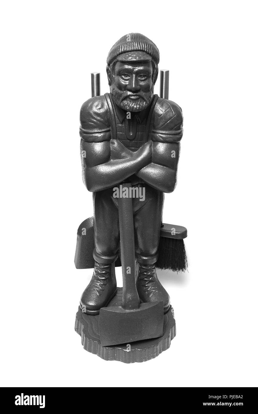 Set for the fireplace. Decorative figurine axeman. Isolated on white ...