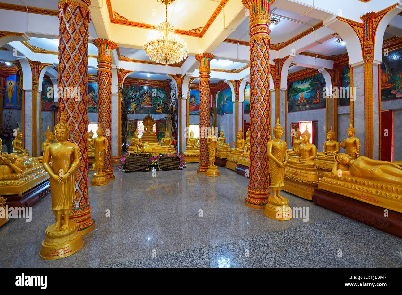 Interior with Buddha's statues, Wat Chalong, the biggest temple on ...