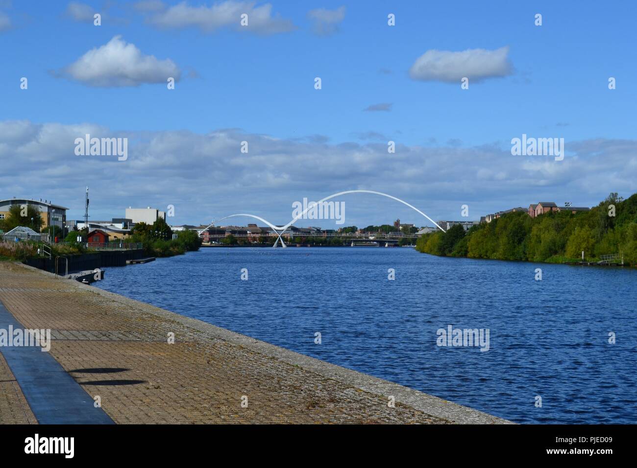 Striking, naturally lit image of the iconic Infinity Bridge spanning ...