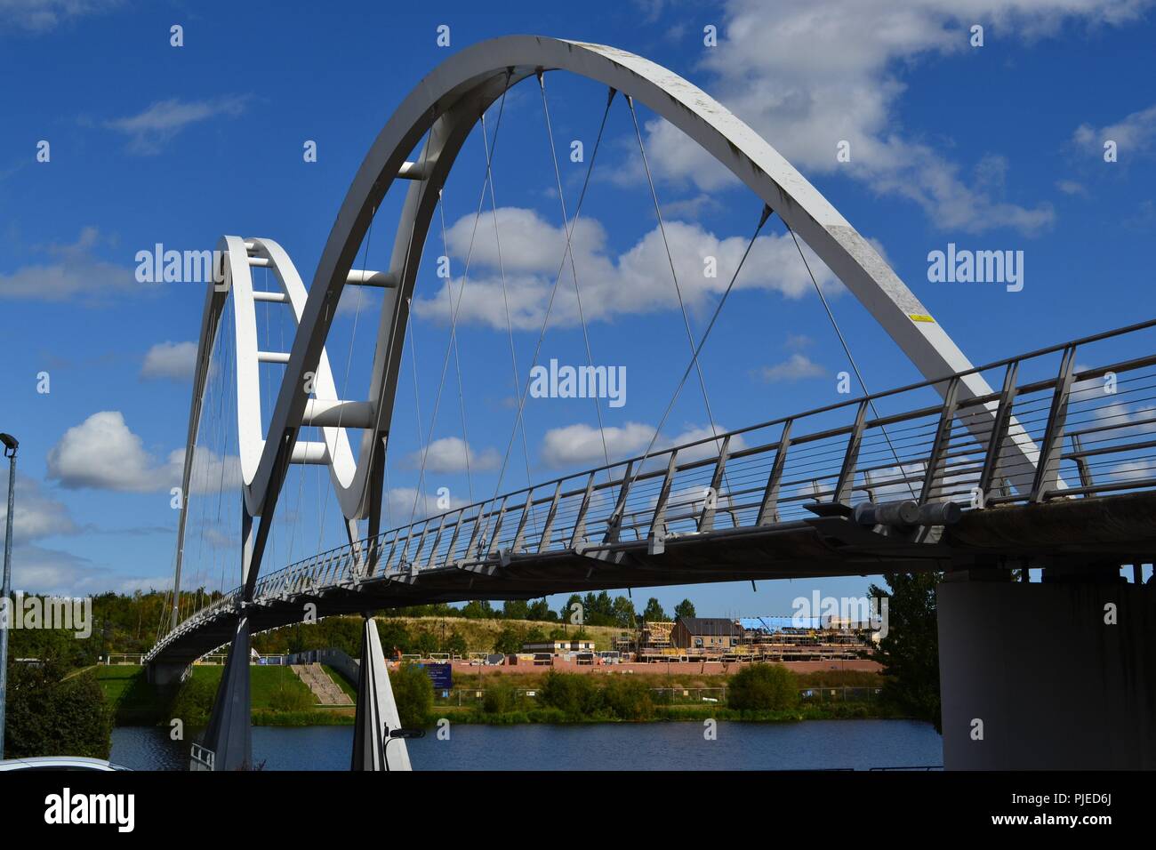 Striking, naturally lit image of the iconic Infinity Bridge spanning ...