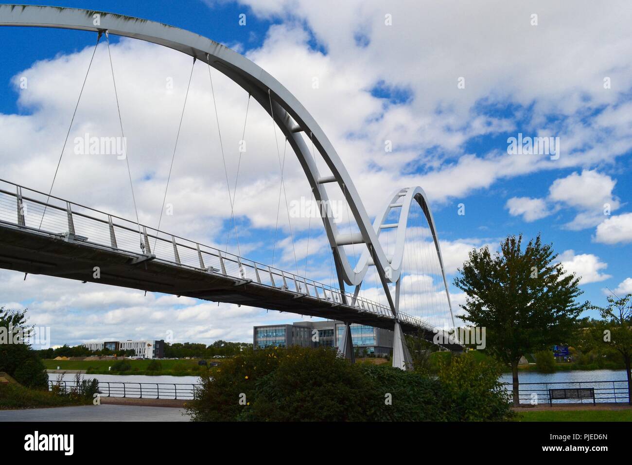 Striking, naturally lit image of the iconic Infinity Bridge spanning ...