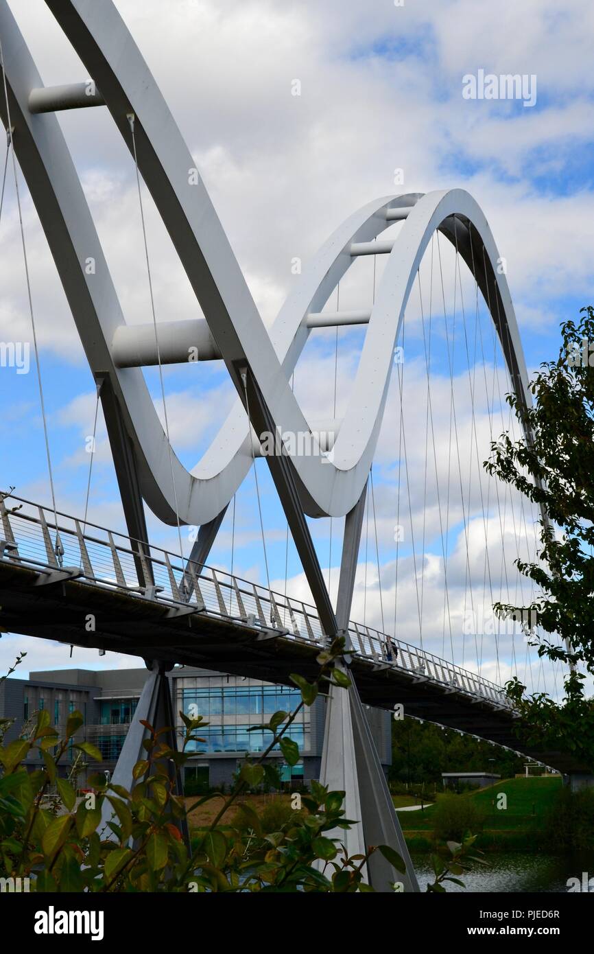 Striking, naturally lit image of the iconic Infinity Bridge spanning ...