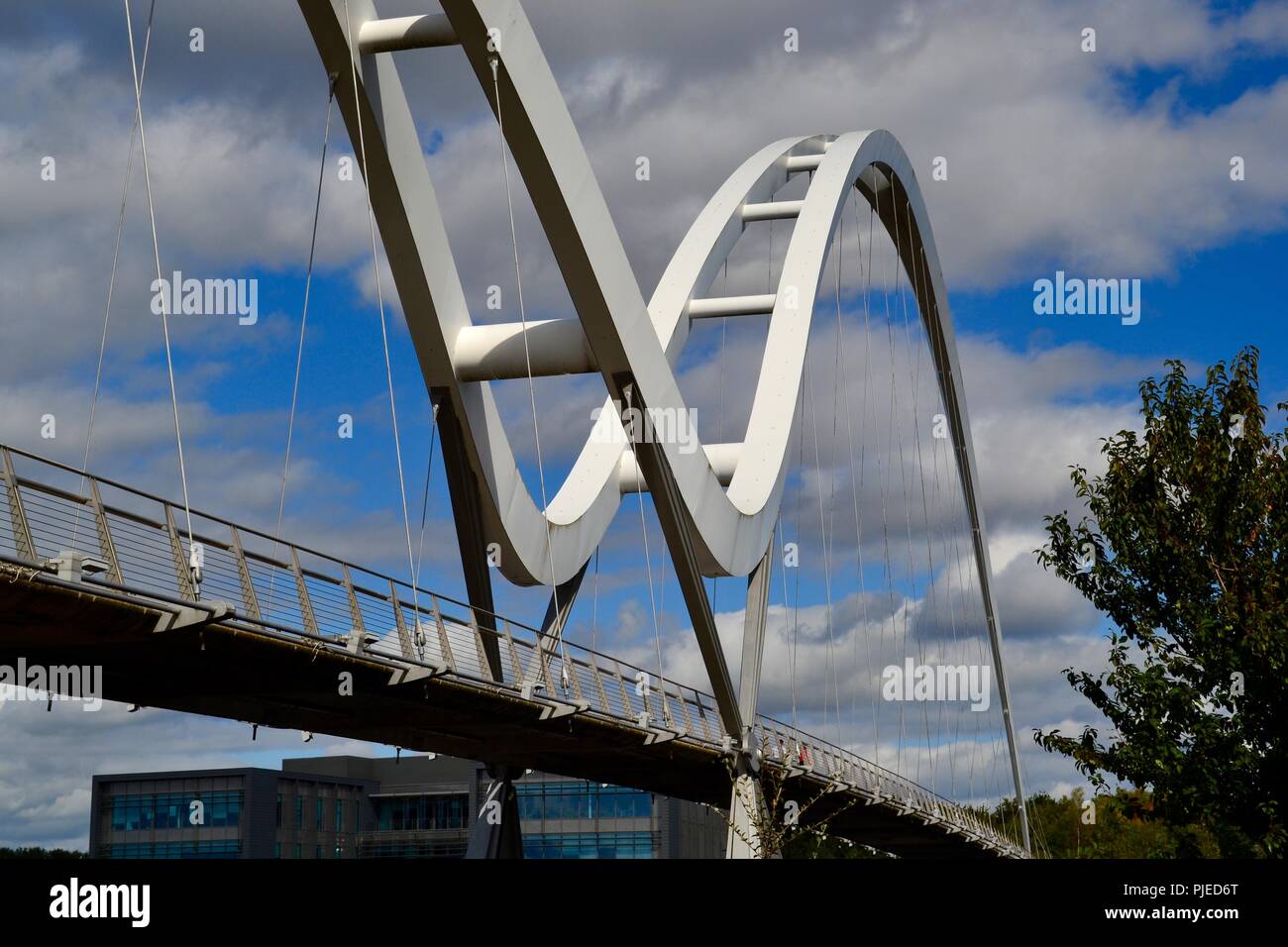 Striking, naturally lit image of the iconic Infinity Bridge spanning ...