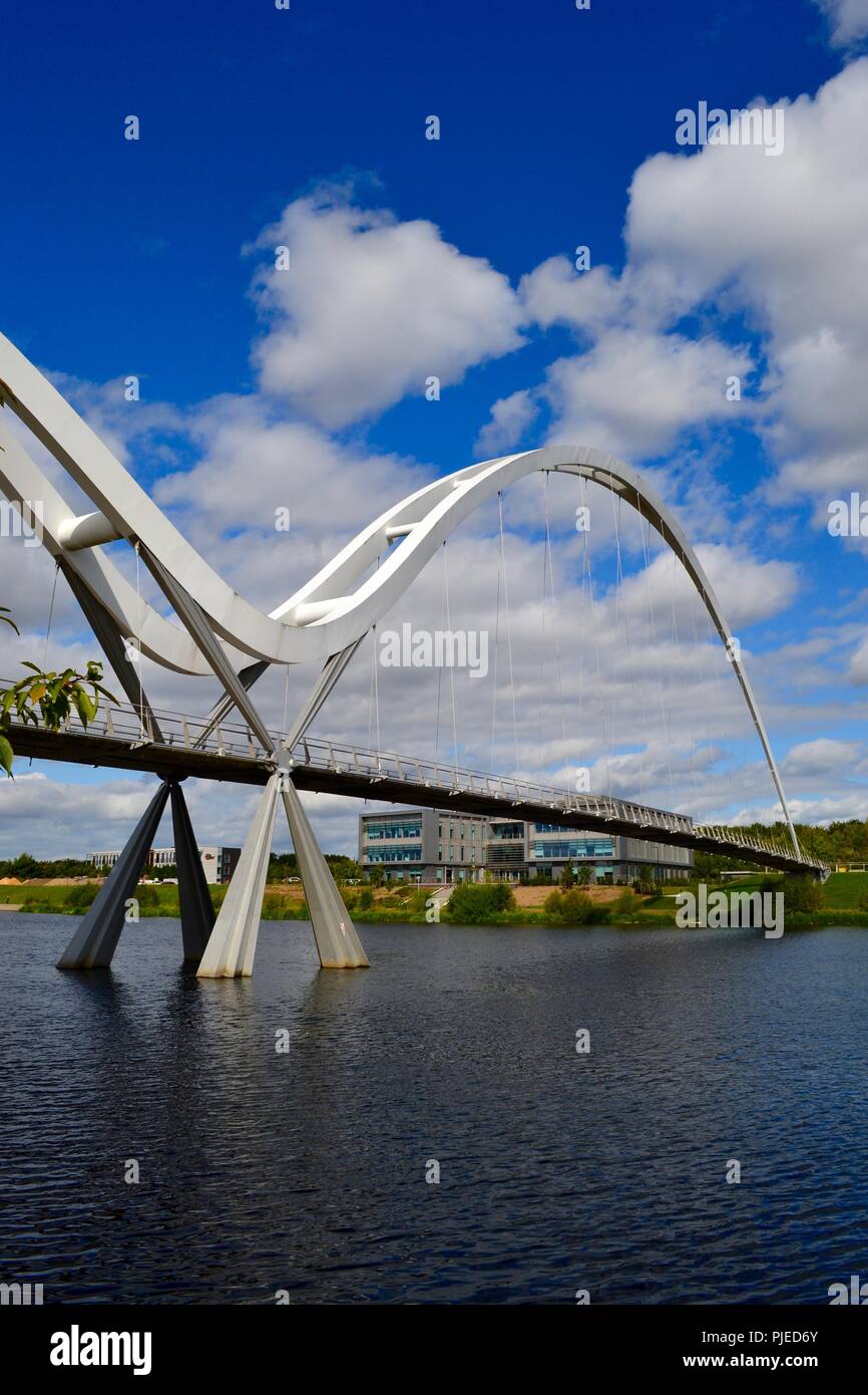 Striking, naturally lit image of the iconic Infinity Bridge spanning ...