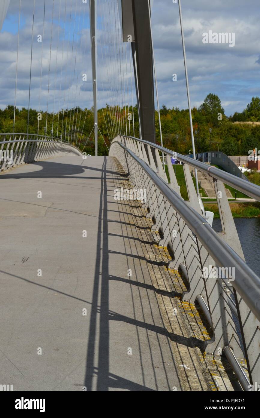 Striking, naturally lit image of the iconic Infinity Bridge spanning ...