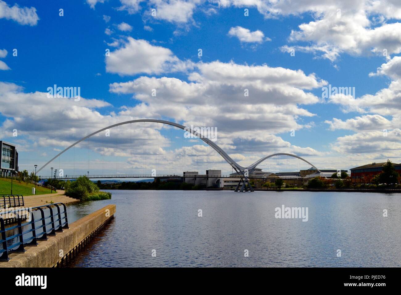 Striking, naturally lit image of the iconic Infinity Bridge spanning ...