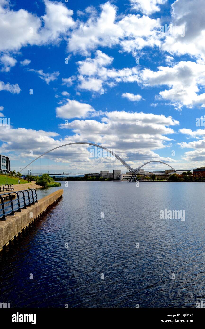 Striking, naturally lit image of the iconic Infinity Bridge spanning ...