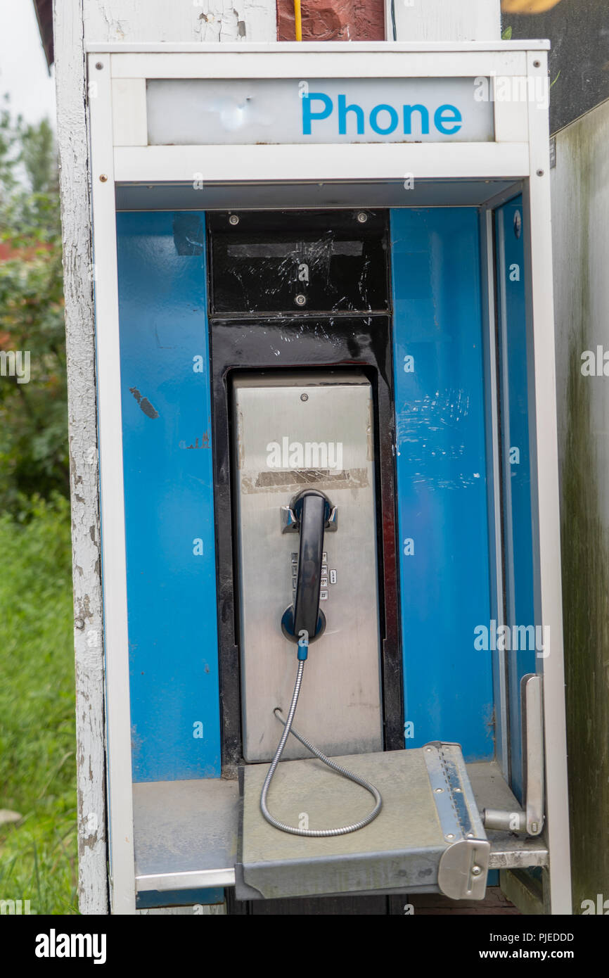 Old fashioned telephone phone booth landline with a phone book Stock ...
