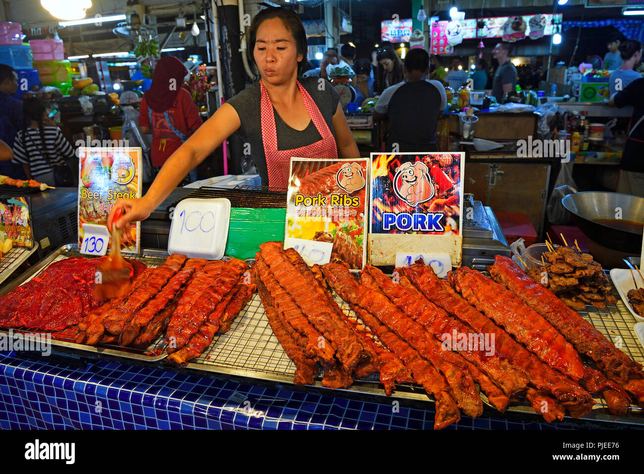 State with dishes typical for country, night market of Patong Beach ...