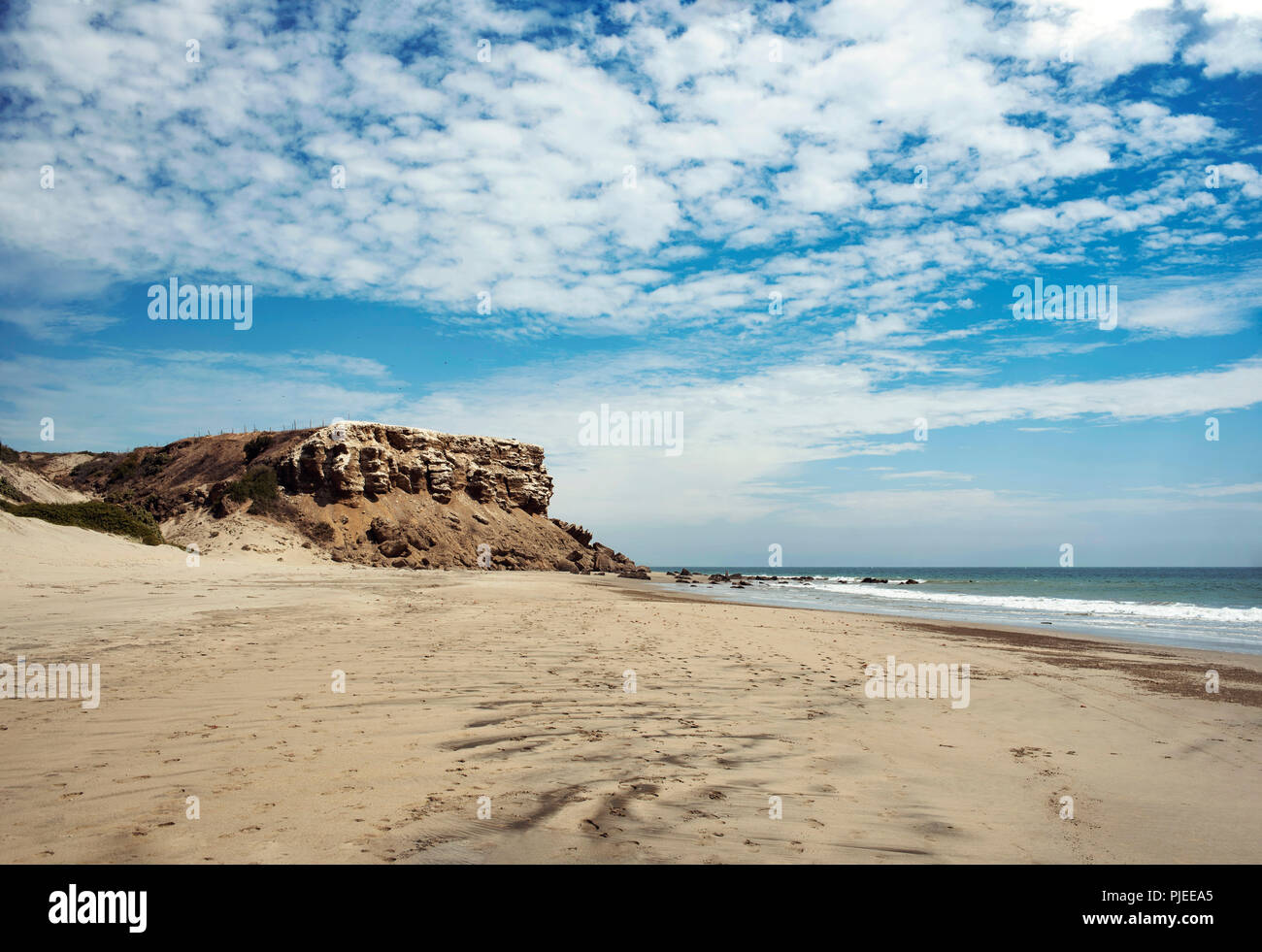 The wide, scenic landscape of Los Organos beach near Mancora beach town ...