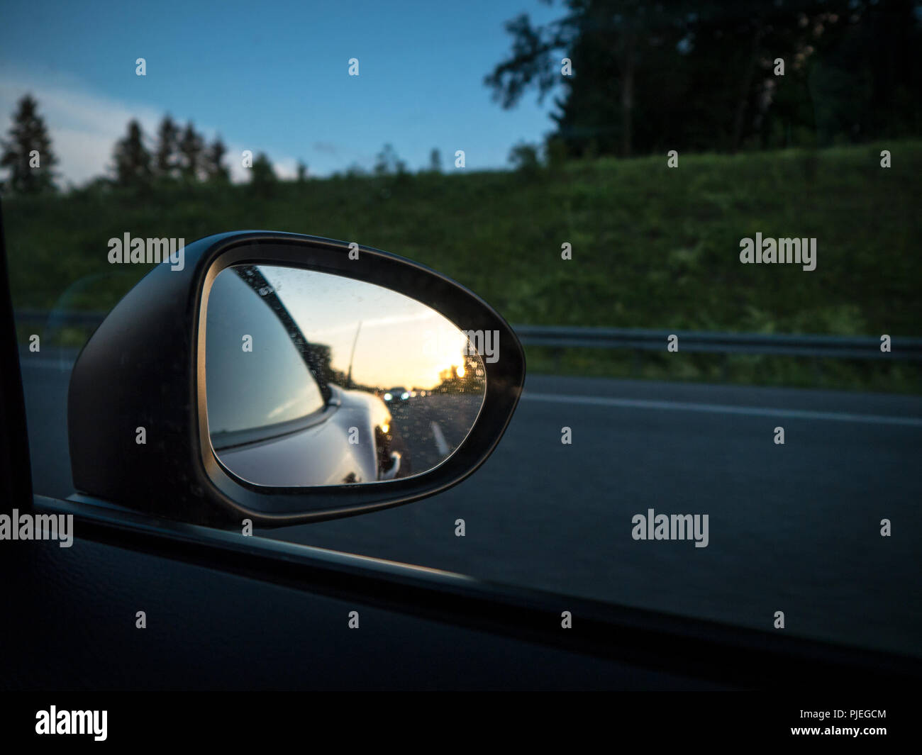 Side view mirror car sunset sky hi-res stock photography and images - Alamy