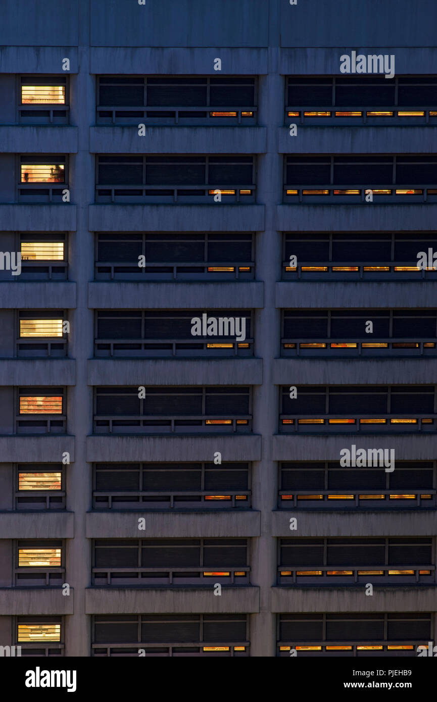 Downtown Seattle courthouse jail exterior with rows of light at sunset ...