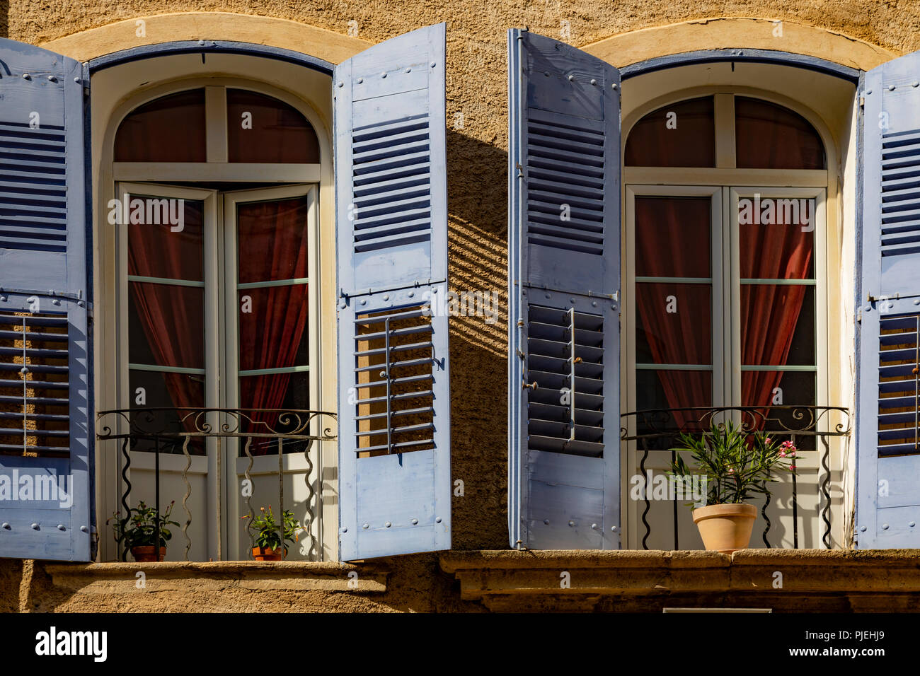 Colorful windows in Souther Provence region of France Stock Photo - Alamy