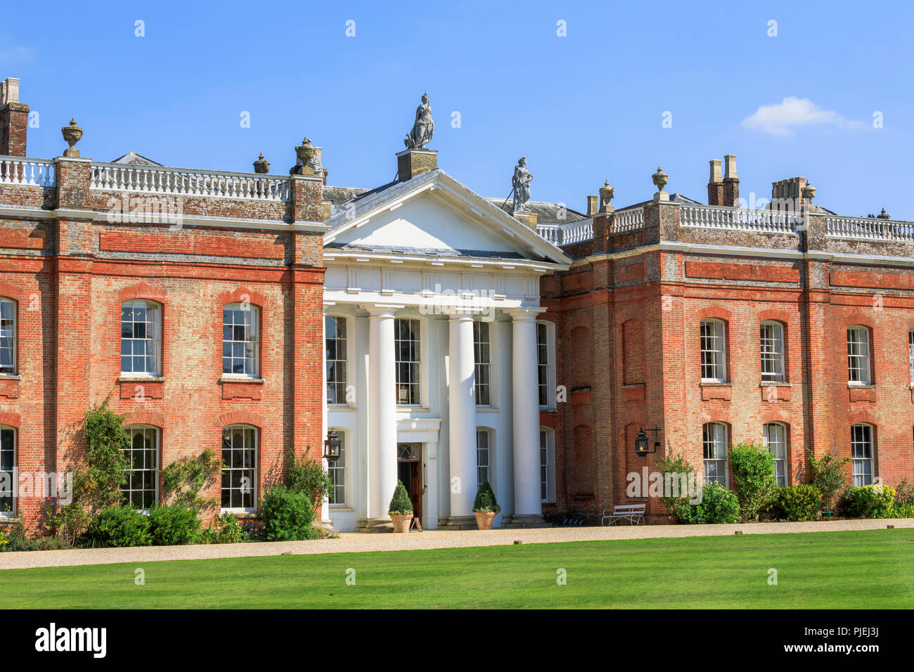 Impressive portico entrance in the facade of Avington Park, a Palladian ...