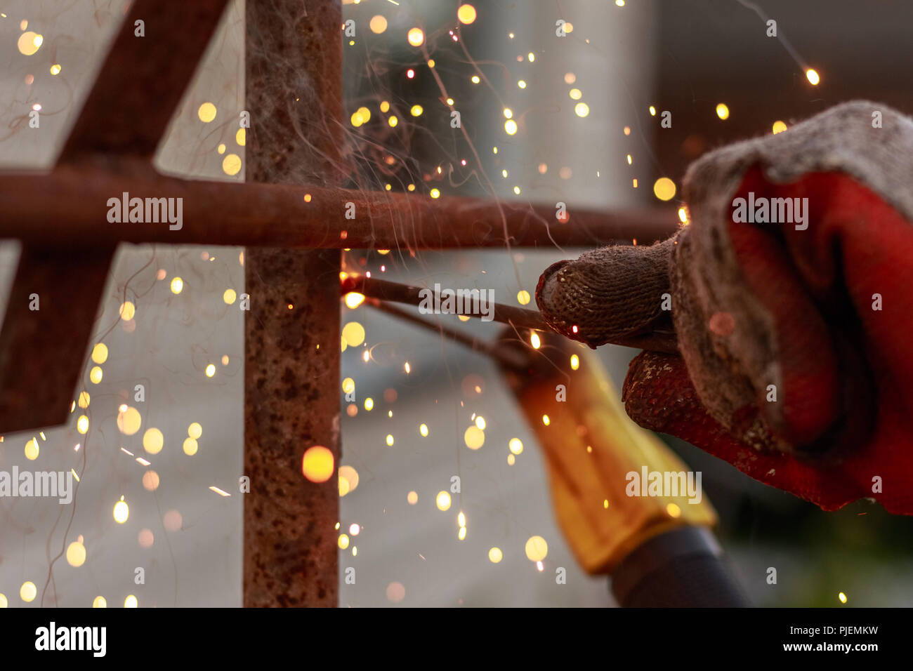 Sparks from welding works close-up arc welding Stock Photo - Alamy