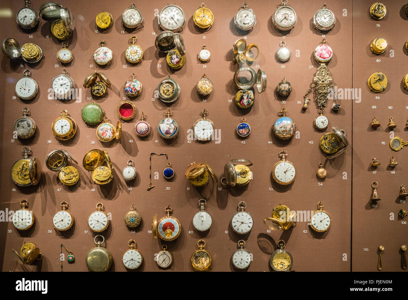 London, England - July 2018 : Old watches on display in museum in the ...