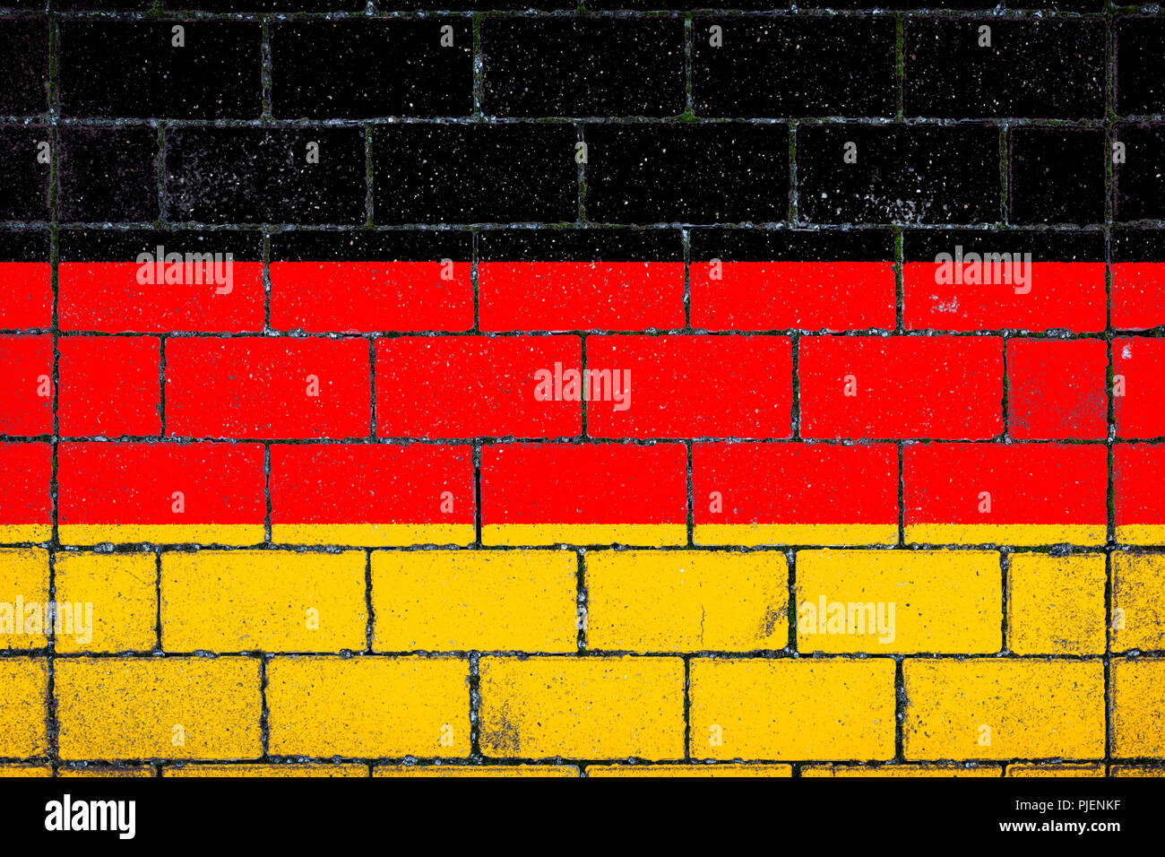 National flag of Germany against a background of a stone background ...