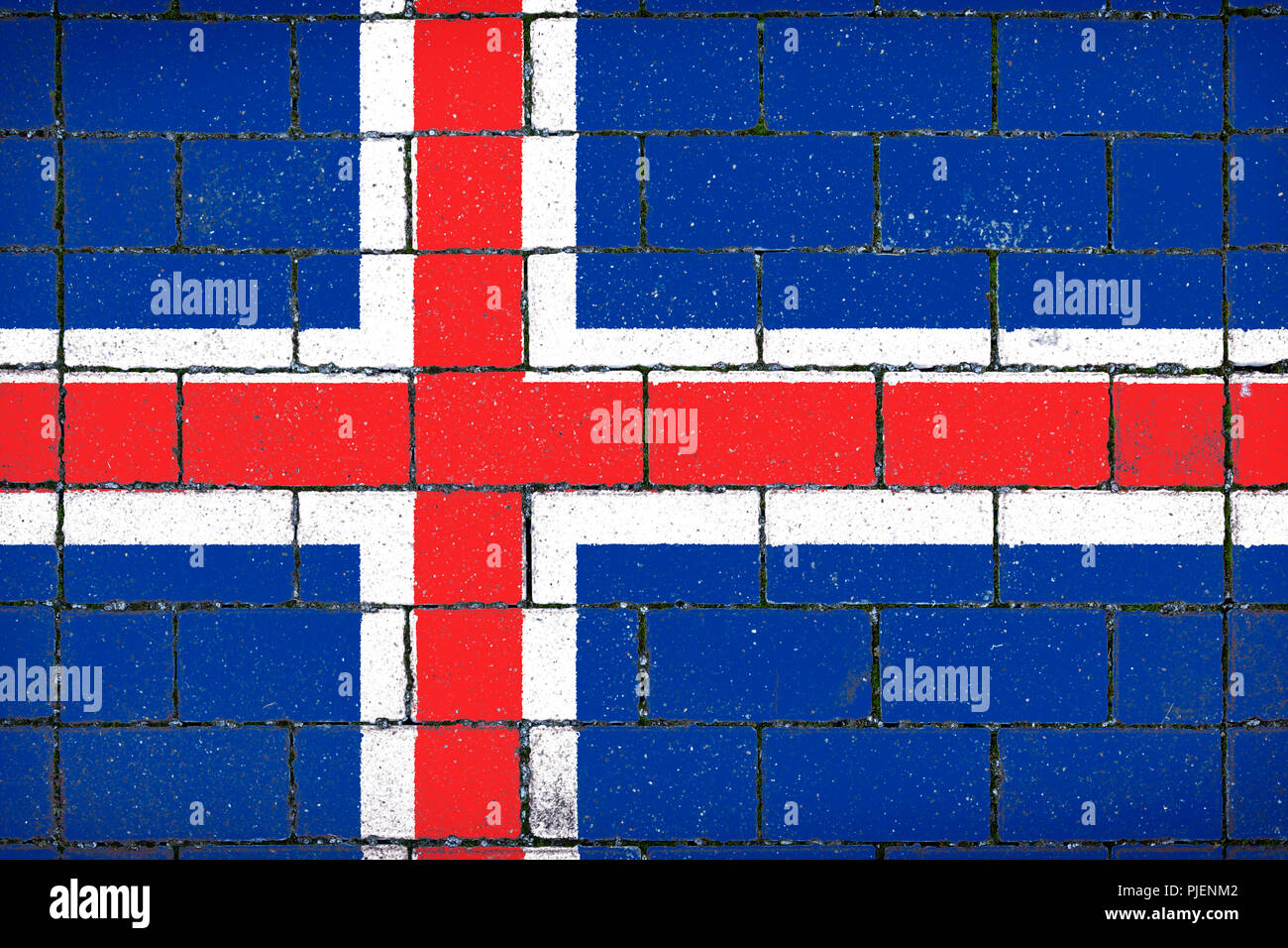 National flag of Iceland against a background of a stone background ...