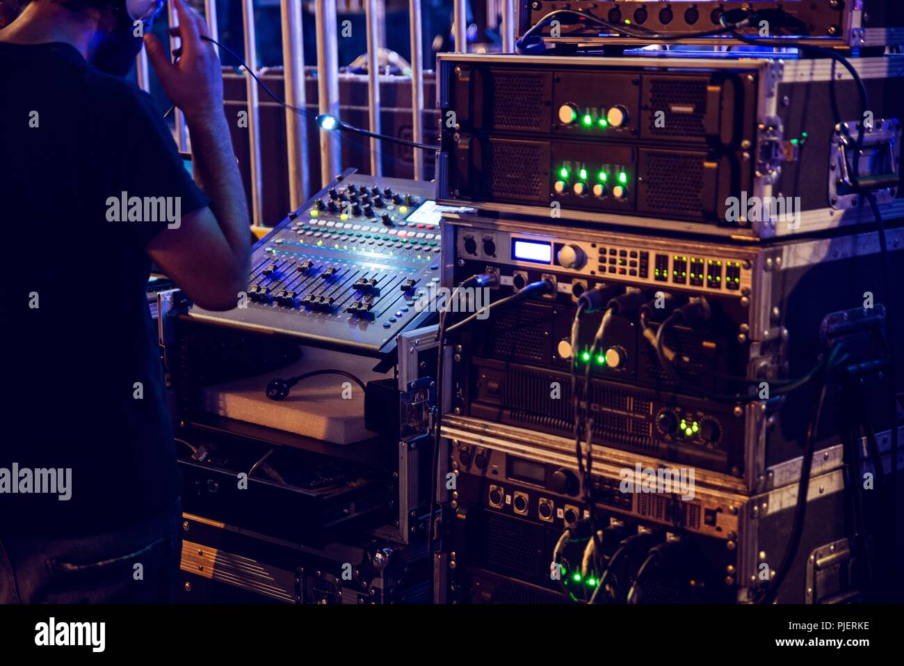 Dj mixing console and music audio amplifiers on concert Stock Photo - Alamy