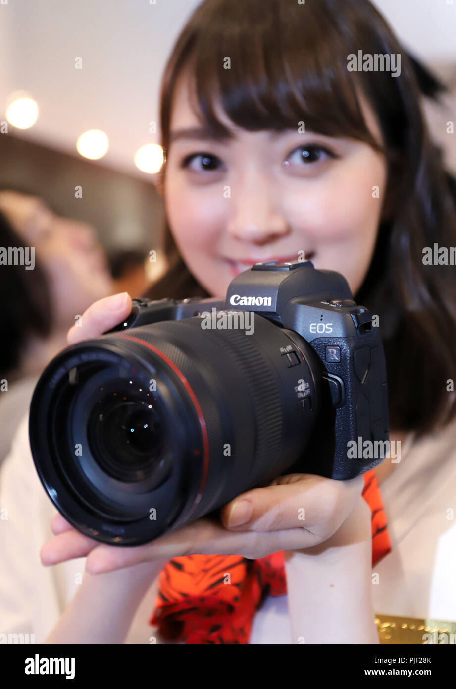 Tokyo, Japan. 5th Sep, 2018. A model displays Japanese camera giant ...