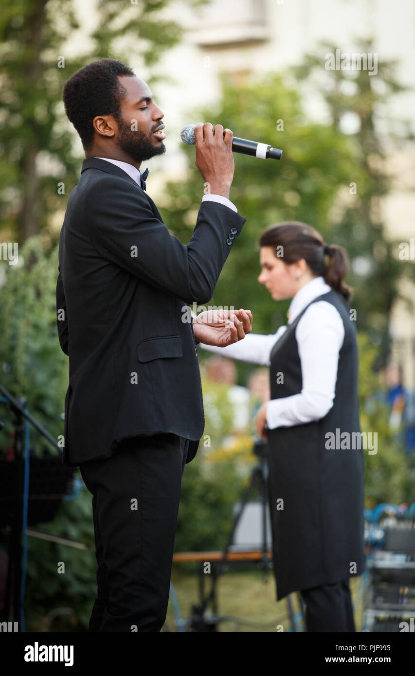 Jazz singer at gala concert. Vitebsk symphonic orchestra at open-air ...
