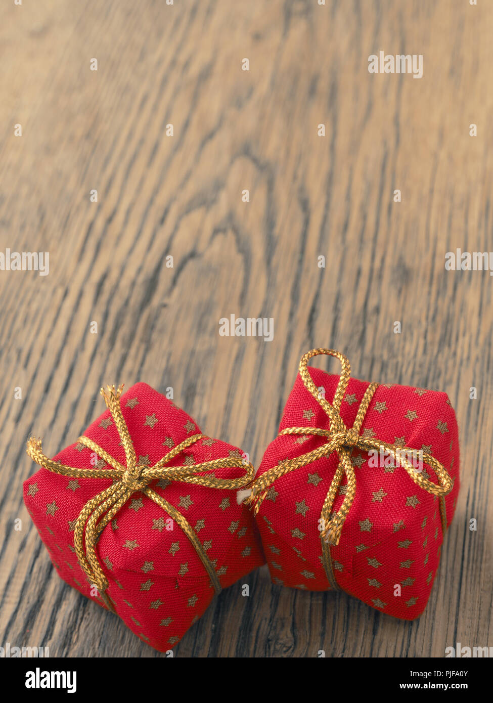 Old Vintage Christmas Gift Boxes On A Wooden Table With Space For Text old-vintage-christmas-gift-boxes-on-a-wooden-table-with-space-for-text