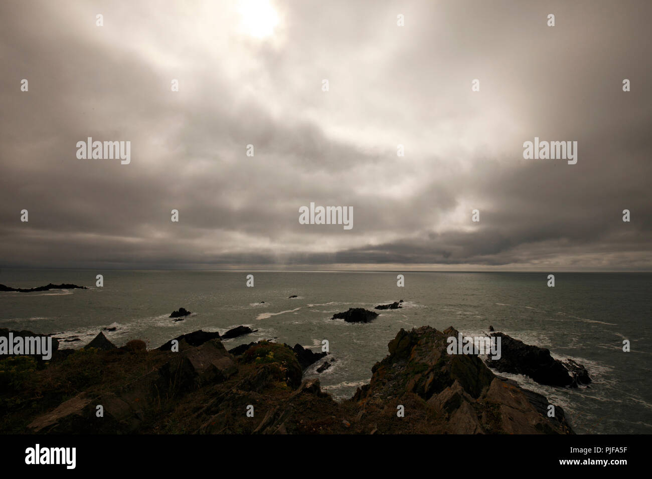 Stormy skies over Hartland Quay rocks Stock Photo - Alamy