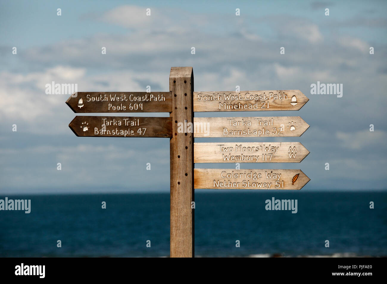 signs showing the various walks and mileage from Lynmouth, North Devon ...