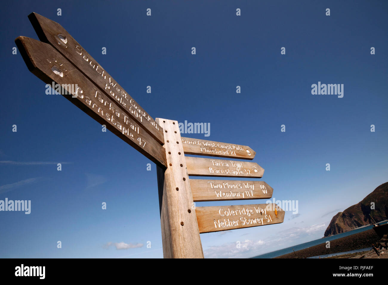 signs showing the various walks and mileage from Lynmouth, North Devon ...