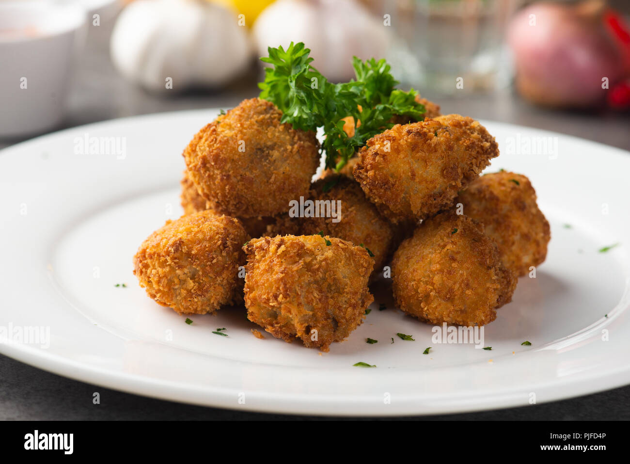 deep fried meatballs on table Stock Photo - Alamy