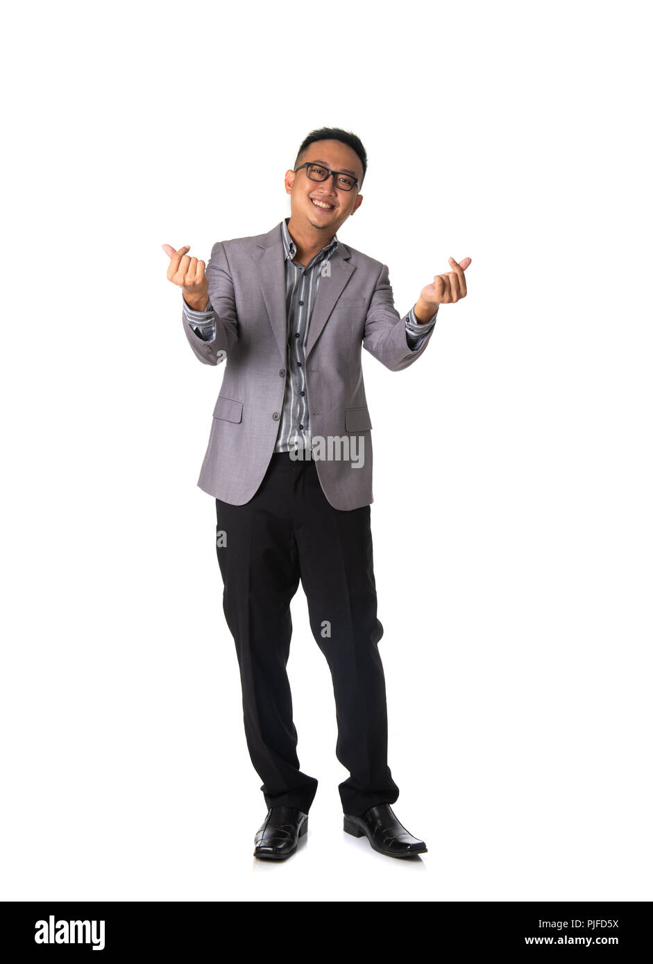 Portrait of hand showing love sign against white background Stock Photo ...