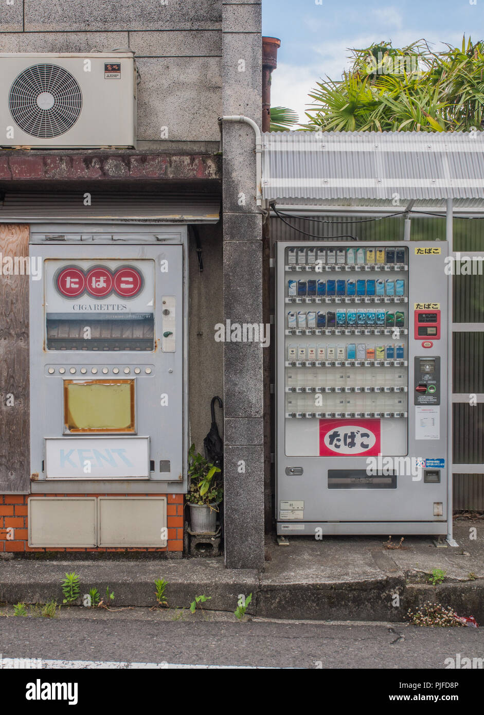 Tobacco vending machines, urban roadside, Ehime, Shikoku, Japan Stock ...