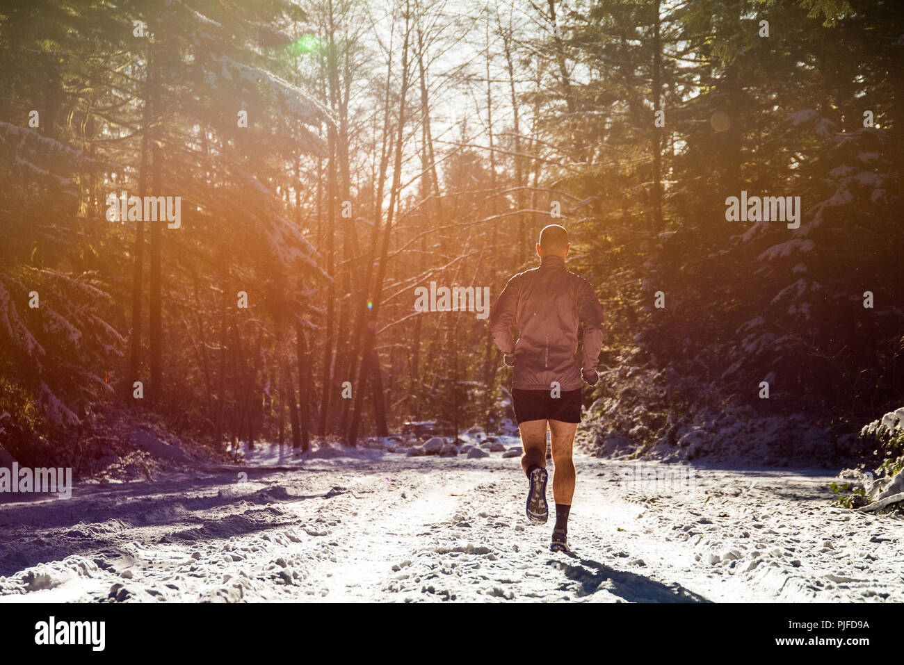man running towards the sun Stock Photo - Alamy