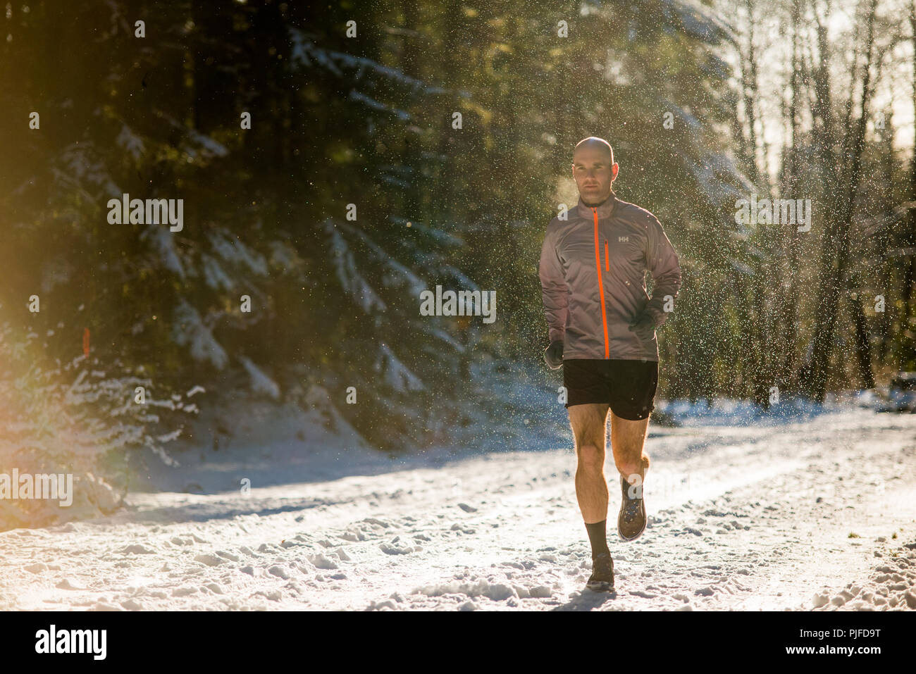 Bald man running hi-res stock photography and images - Alamy