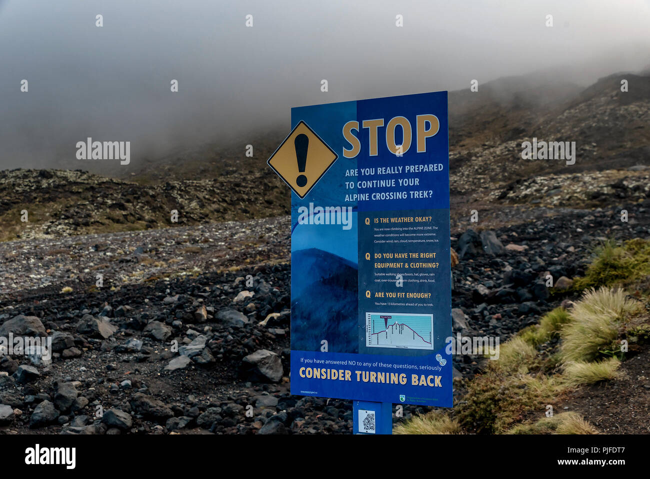 Stop sign at Tongariro Alpine trail Crossing, New Zealand Stock Photo ...