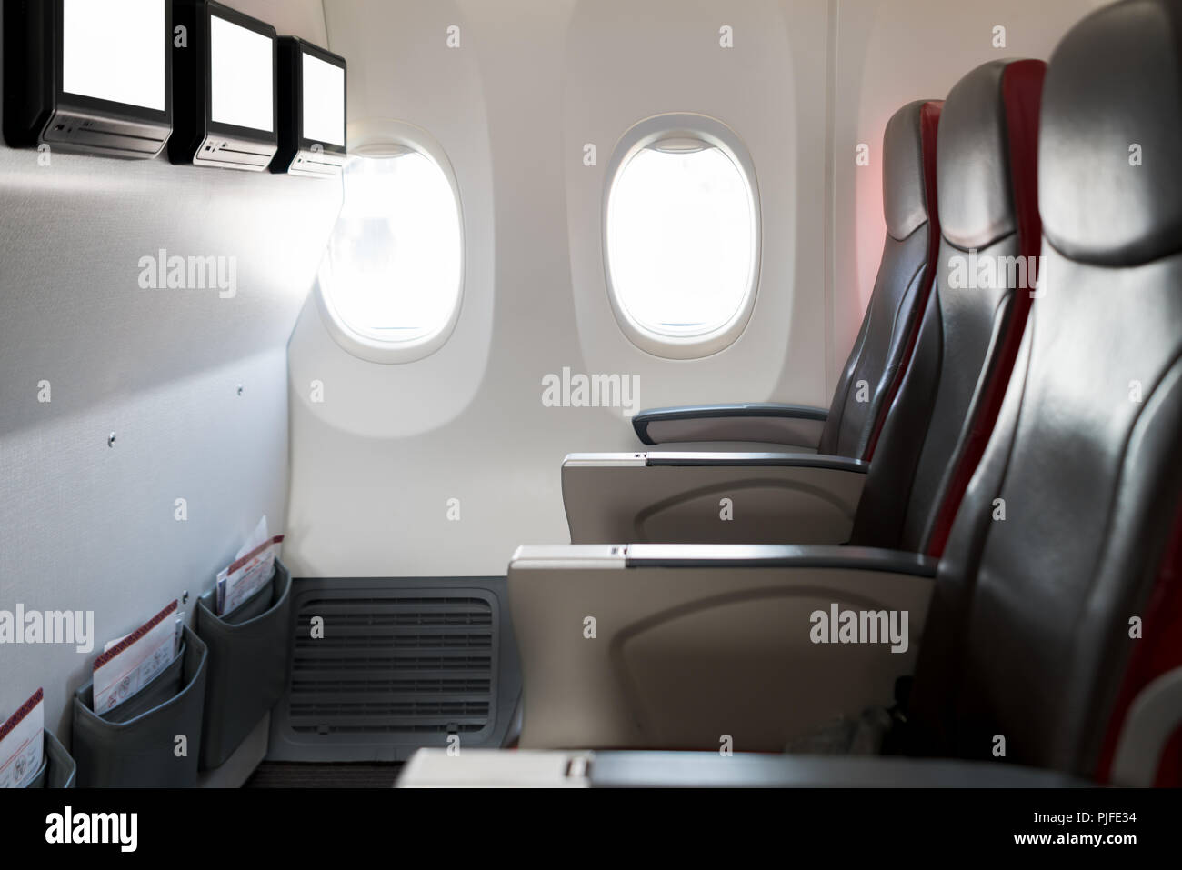 Empty airplane interior hi-res stock photography and images - Alamy