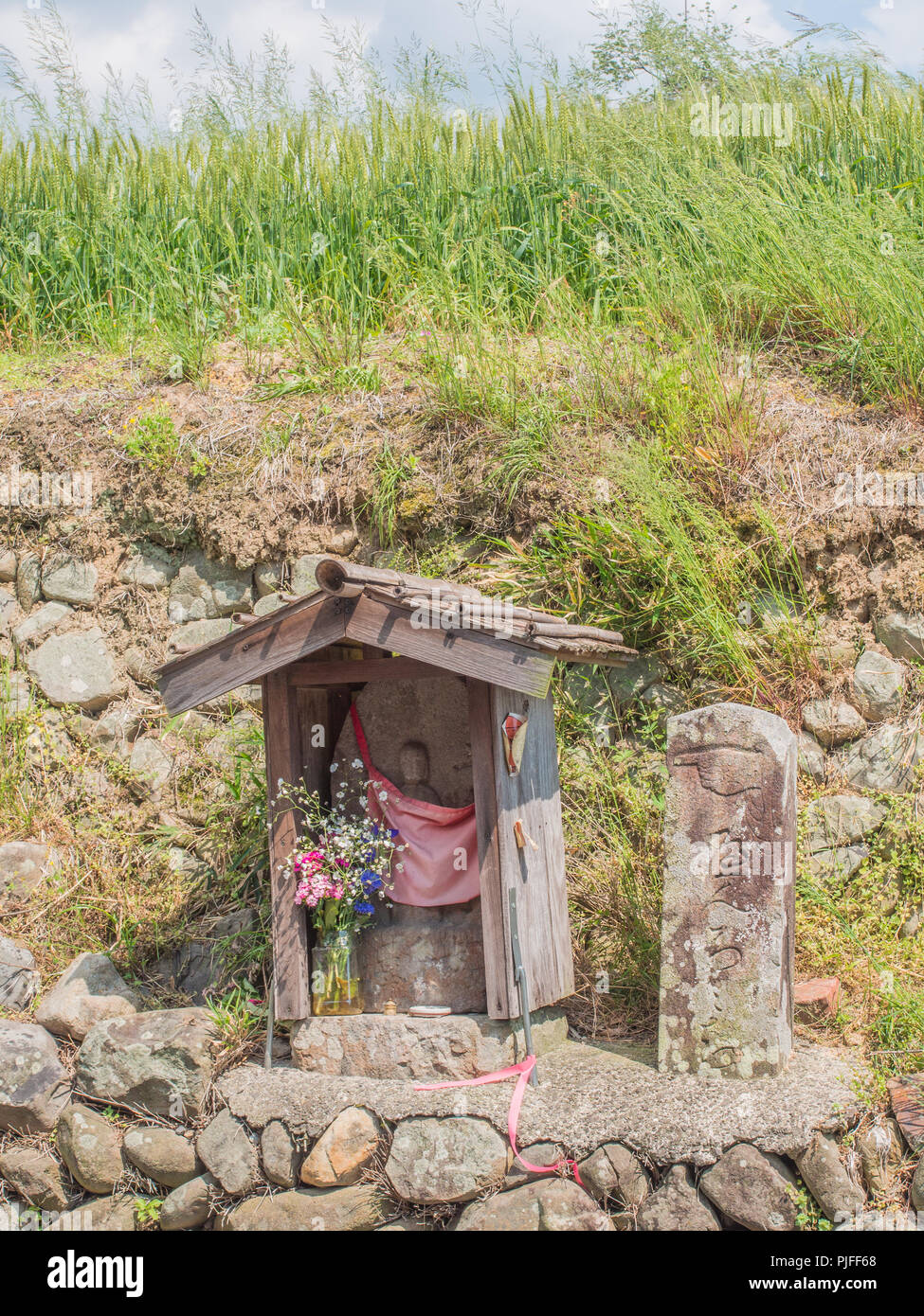 Roadside shrine and finger post guide marker, henro no michi pilgrim ...