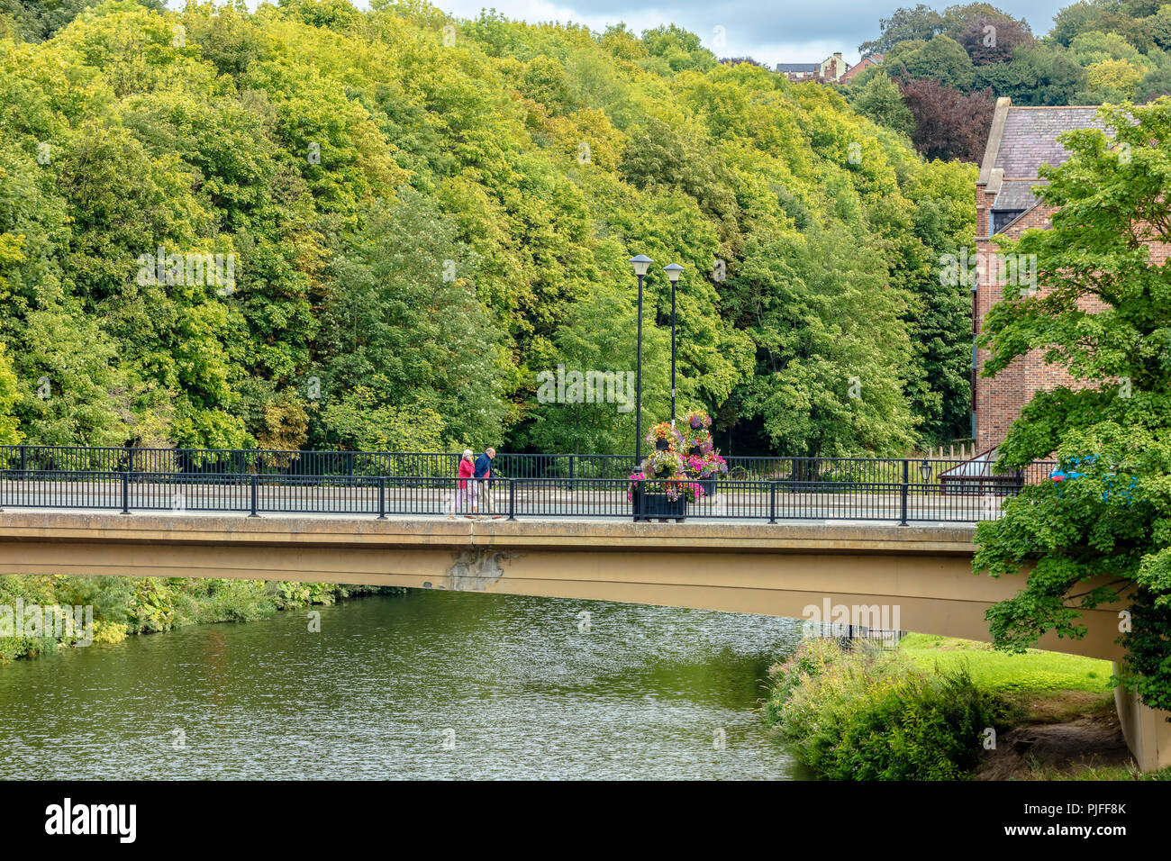 Durham city centre street scene along River Wear and New Elvet Bridge ...