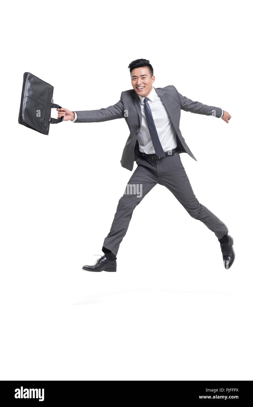 Indian businessman running hi-res stock photography and images - Alamy