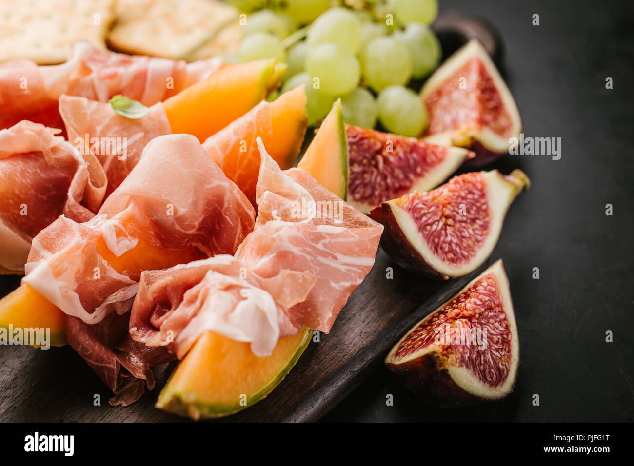 Tasty spanish traditional food - mediterranian appetizers with melon ...